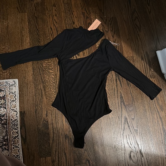Tops | Black Long Sleeve Bodysuit Nwt Unique Neckchest Line Cut Outs ...